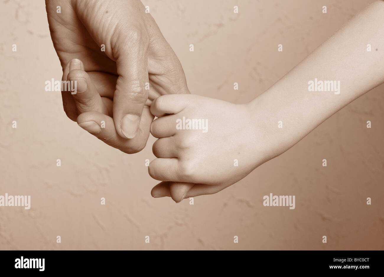Hand together love family sign Stock Photo - Alamy