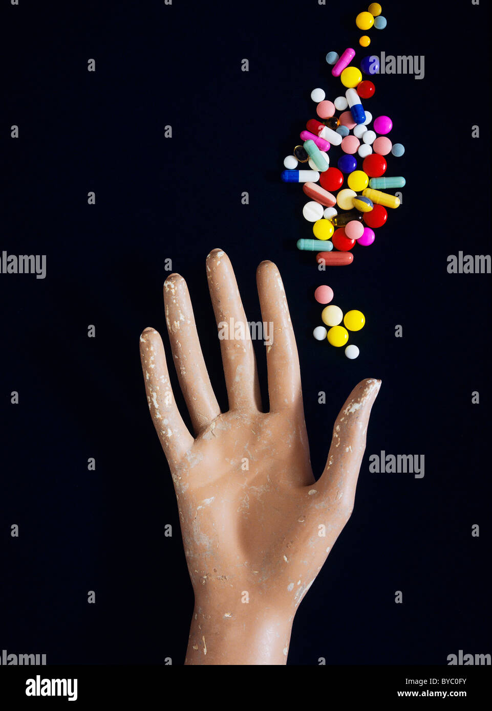 DUMMY HAND WITH PHARMACEUTICAL CAPSULES PILLS & TABLETS Stock Photo - Alamy