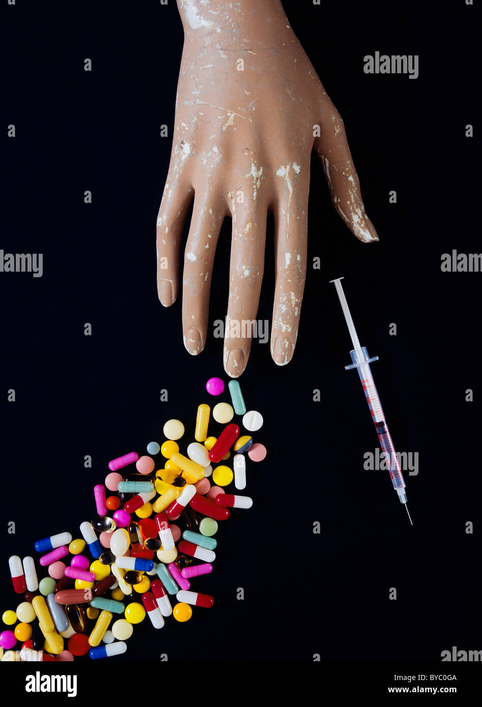 DUMMY HAND WITH PHARMACEUTICAL CAPSULES PILLS TABLETS & HYPODERMIC ...