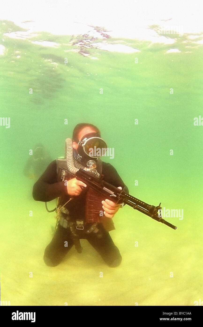 Ukrainian underwater special forces. Military diver with submachine gun ...