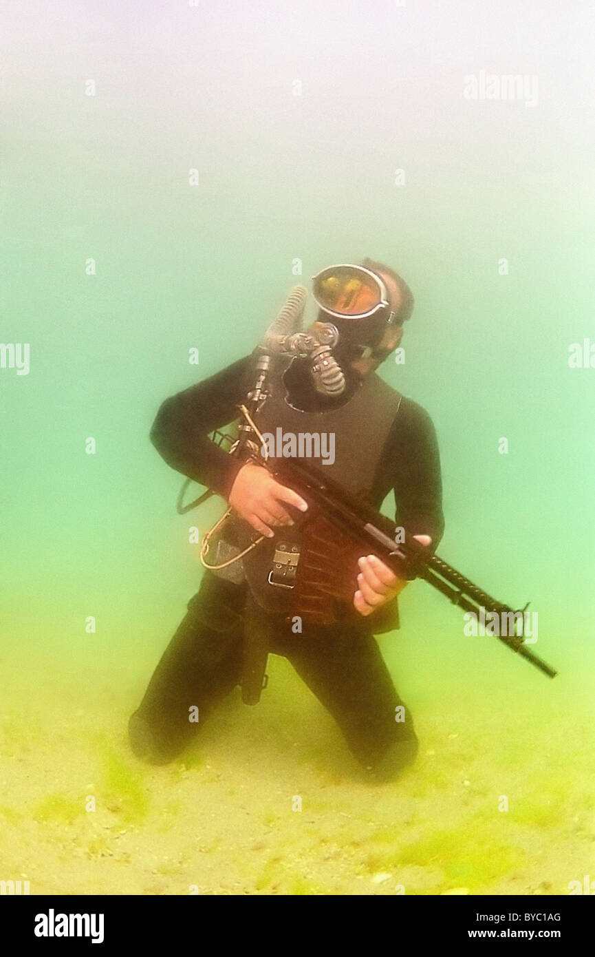 Ukrainian underwater special forces. Military diver with submachine gun ...
