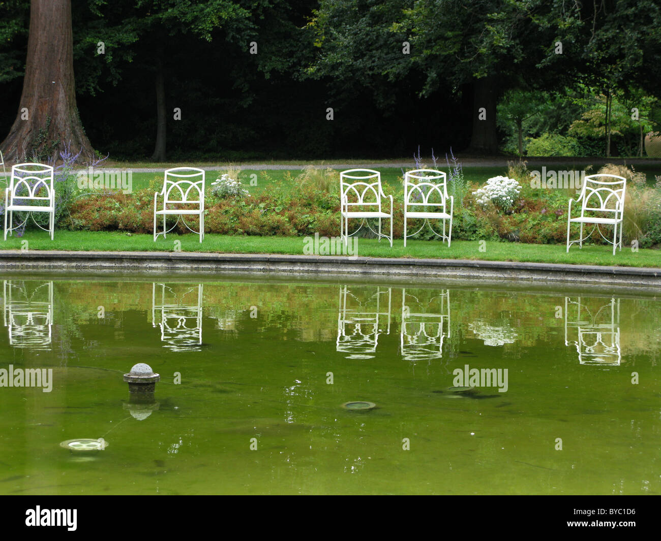 White chairs reflected hi-res stock photography and images - Alamy