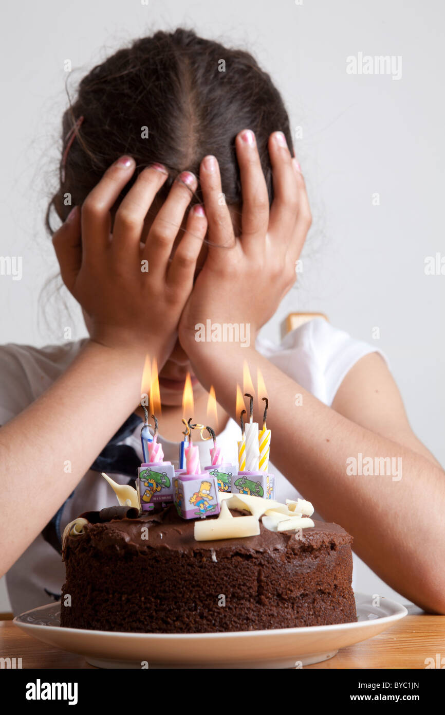 Girl hiding behind cake hi-res stock photography and images - Alamy