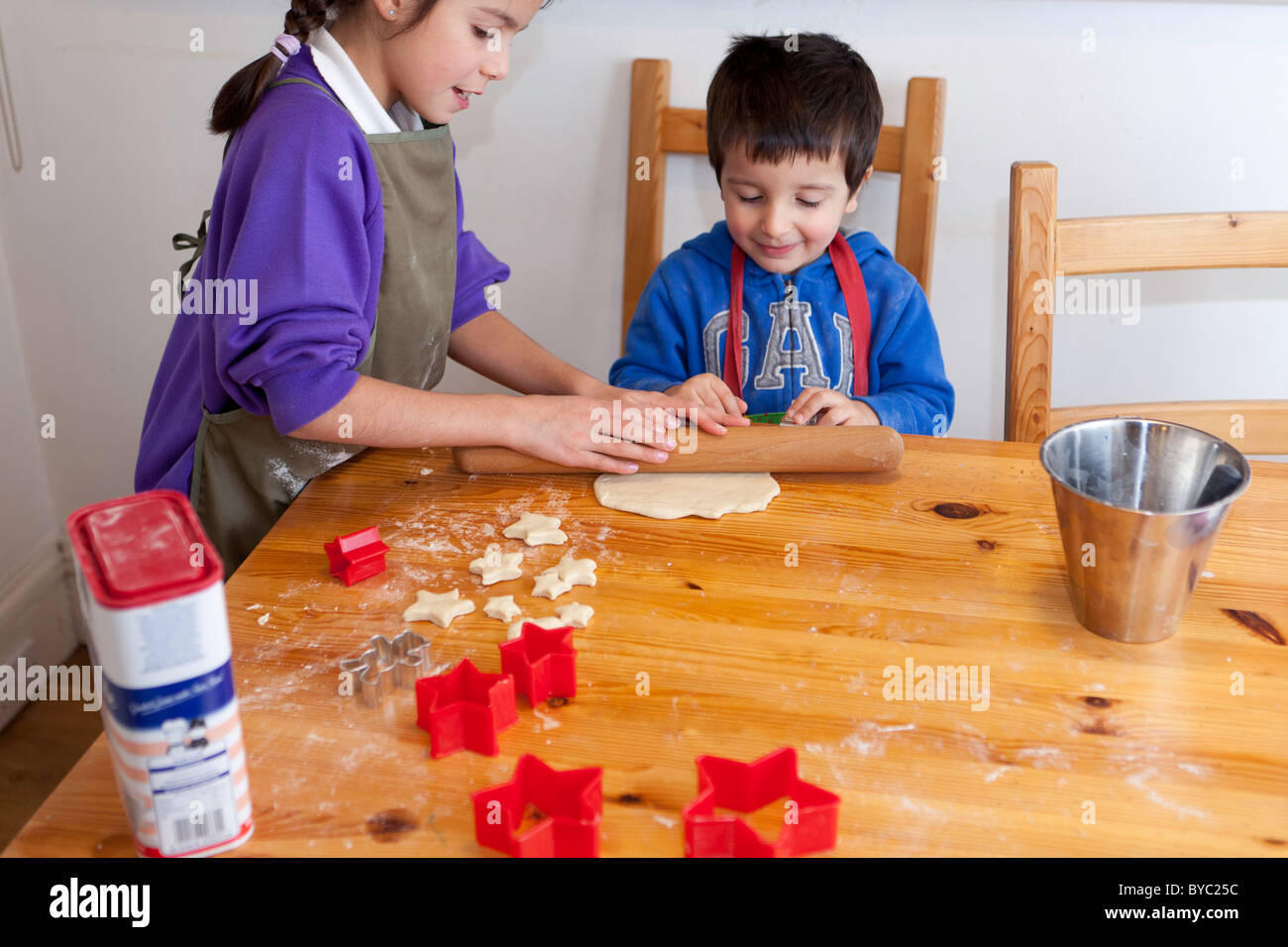 children making biscuits together Stock Photo - Alamy