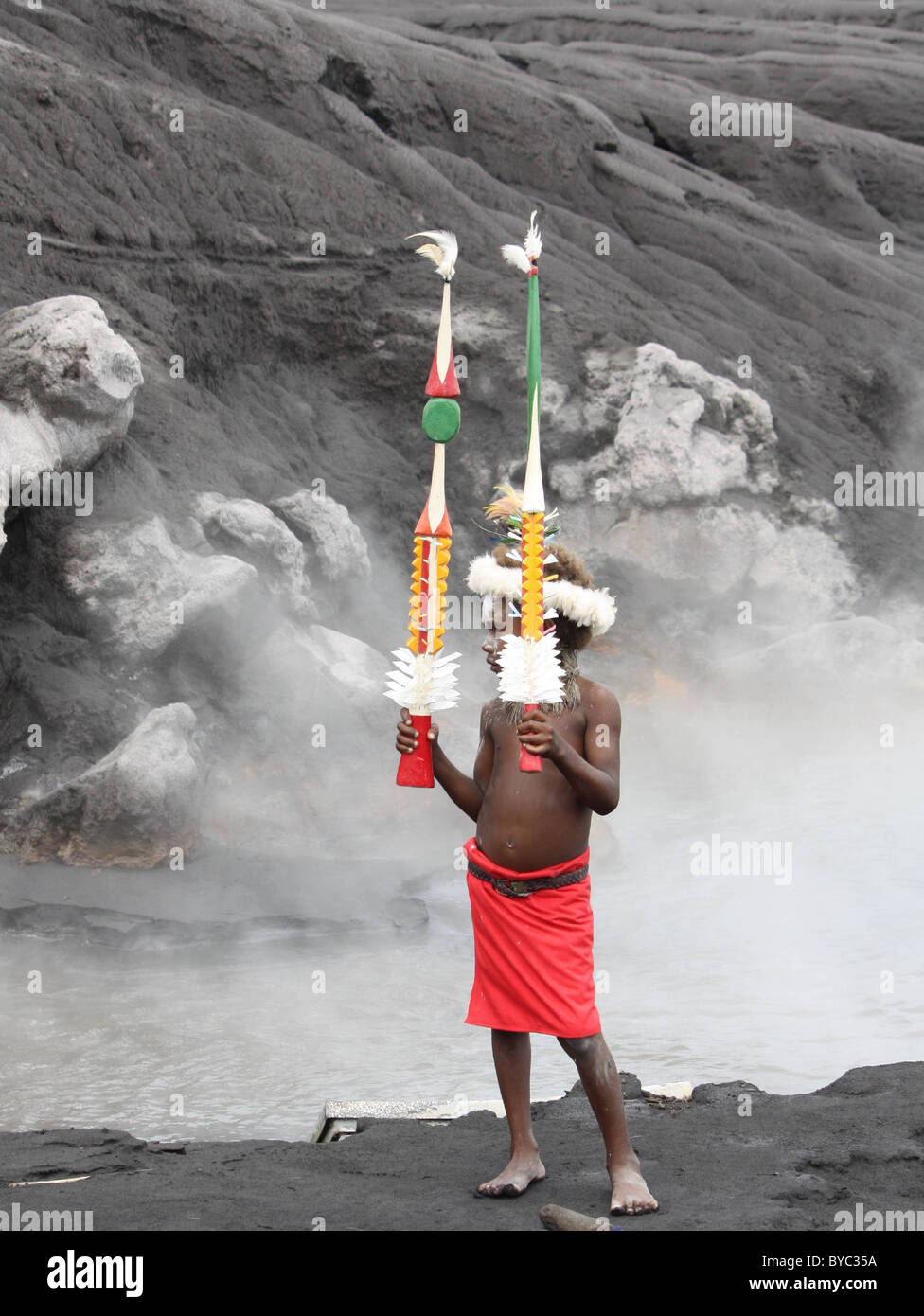 Island boy posing at a volcanic vent Stock Photo - Alamy