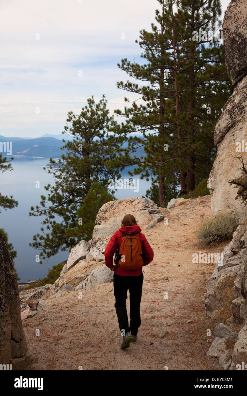 Woman walking lake trail hi-res stock photography and images - Alamy