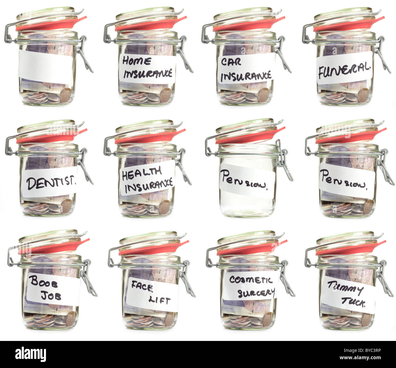 isolated white savings jars with saving titles on labels Stock Photo ...