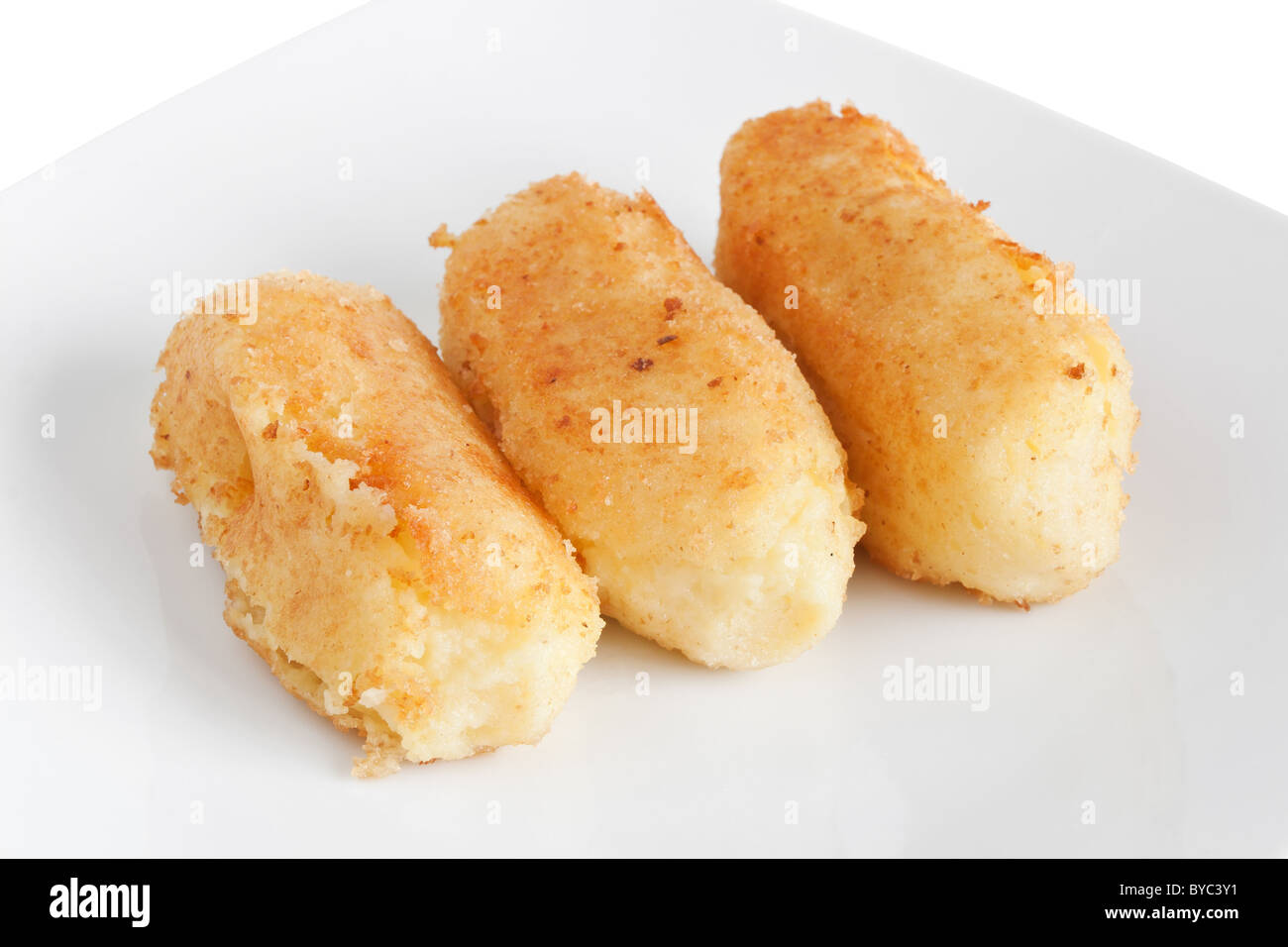 dish with potato croquettes isolated on white background with clipping ...