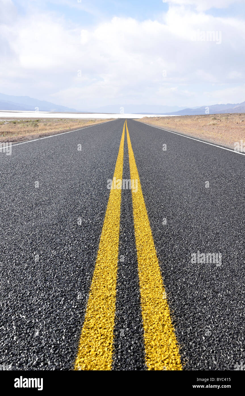 Closeup of the yellow road dividing line Stock Photo - Alamy