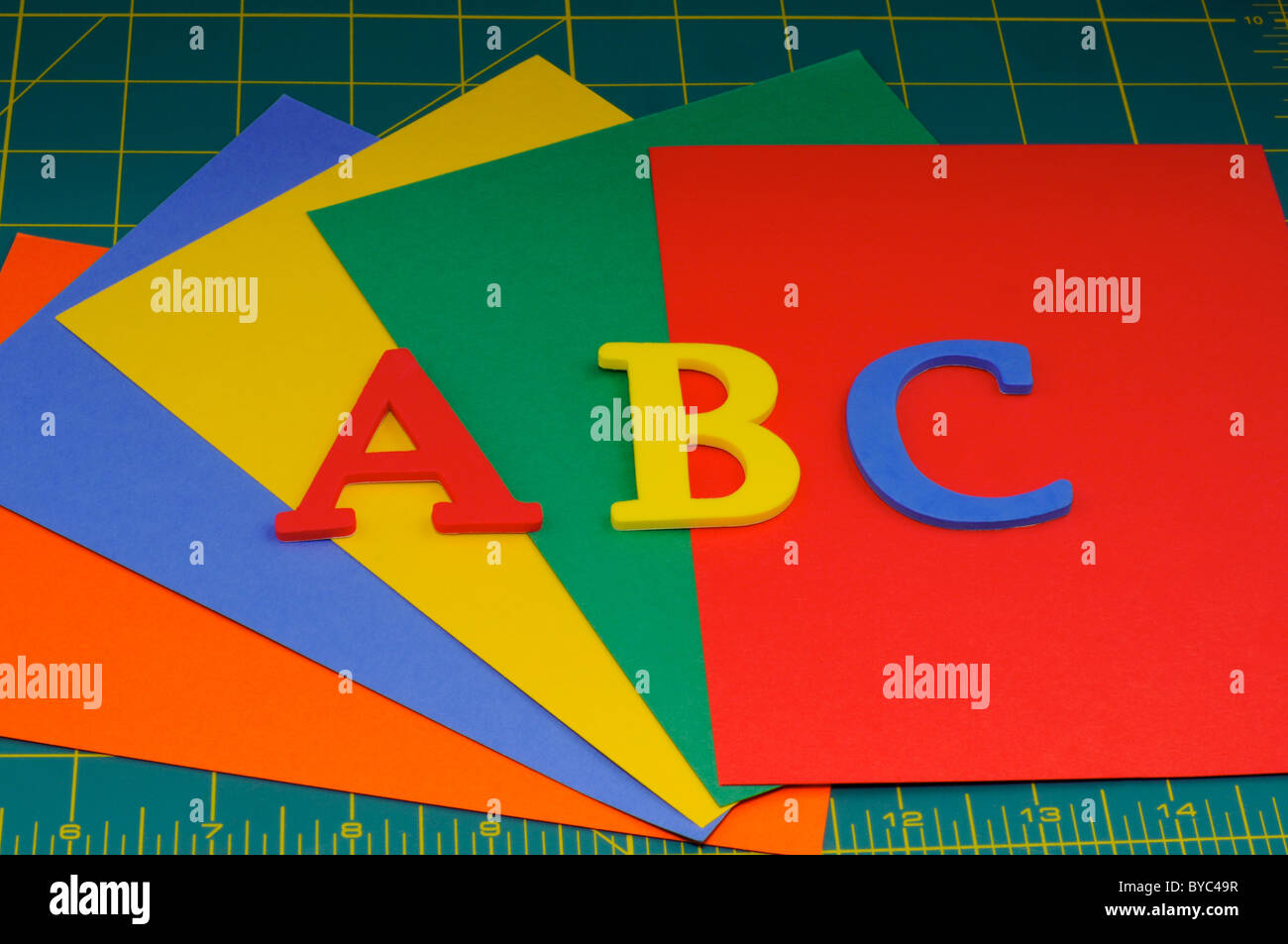 ABC letters and colorful paper Stock Photo - Alamy