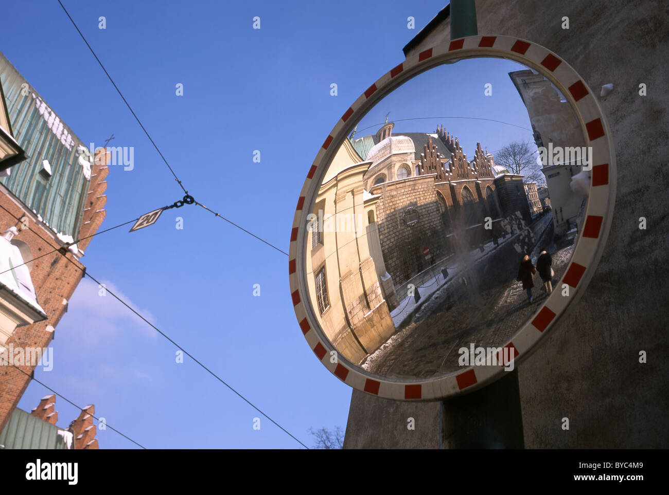 Circular visibility mirror fixed to building in Krakow, Poland Stock ...
