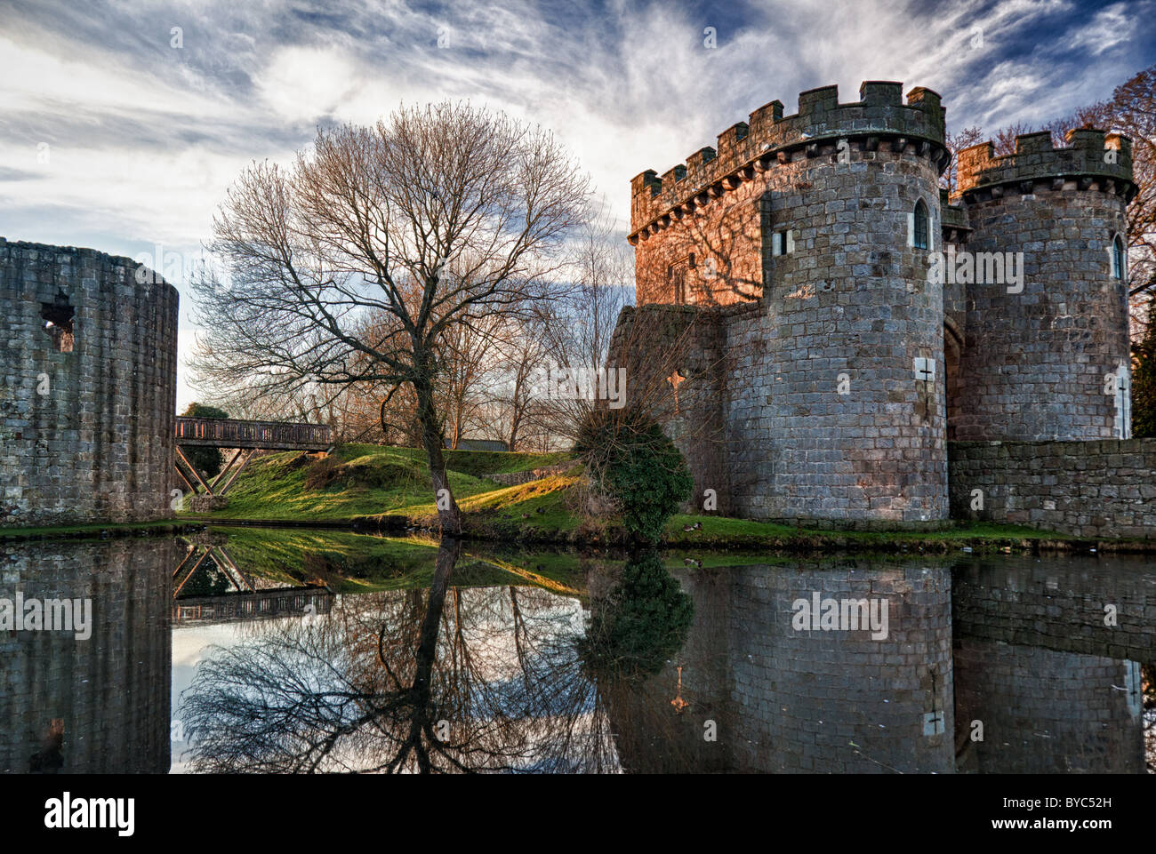 Ancient Whittington Castle in Shropshire, England reflecting in a calm ...