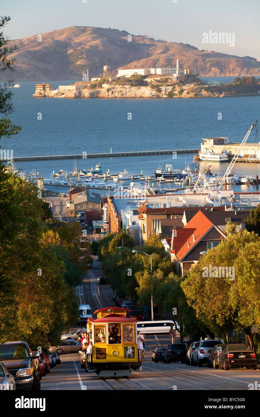 Riding the historic Powell-Hyde cable car, Alcatraz in background, San ...
