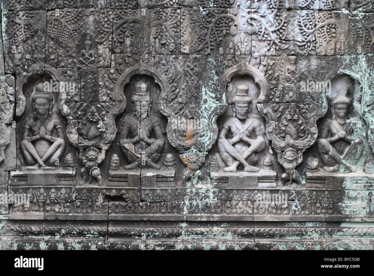Cambodia temple engravings, Angkor Wat Stock Photo - Alamy