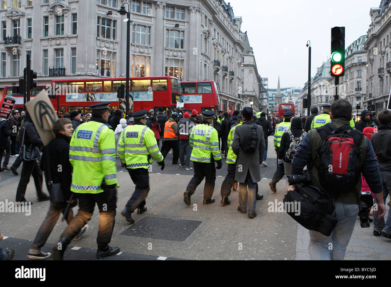 Police rush to contain protesters in Oxford Street Stock Photo - Alamy