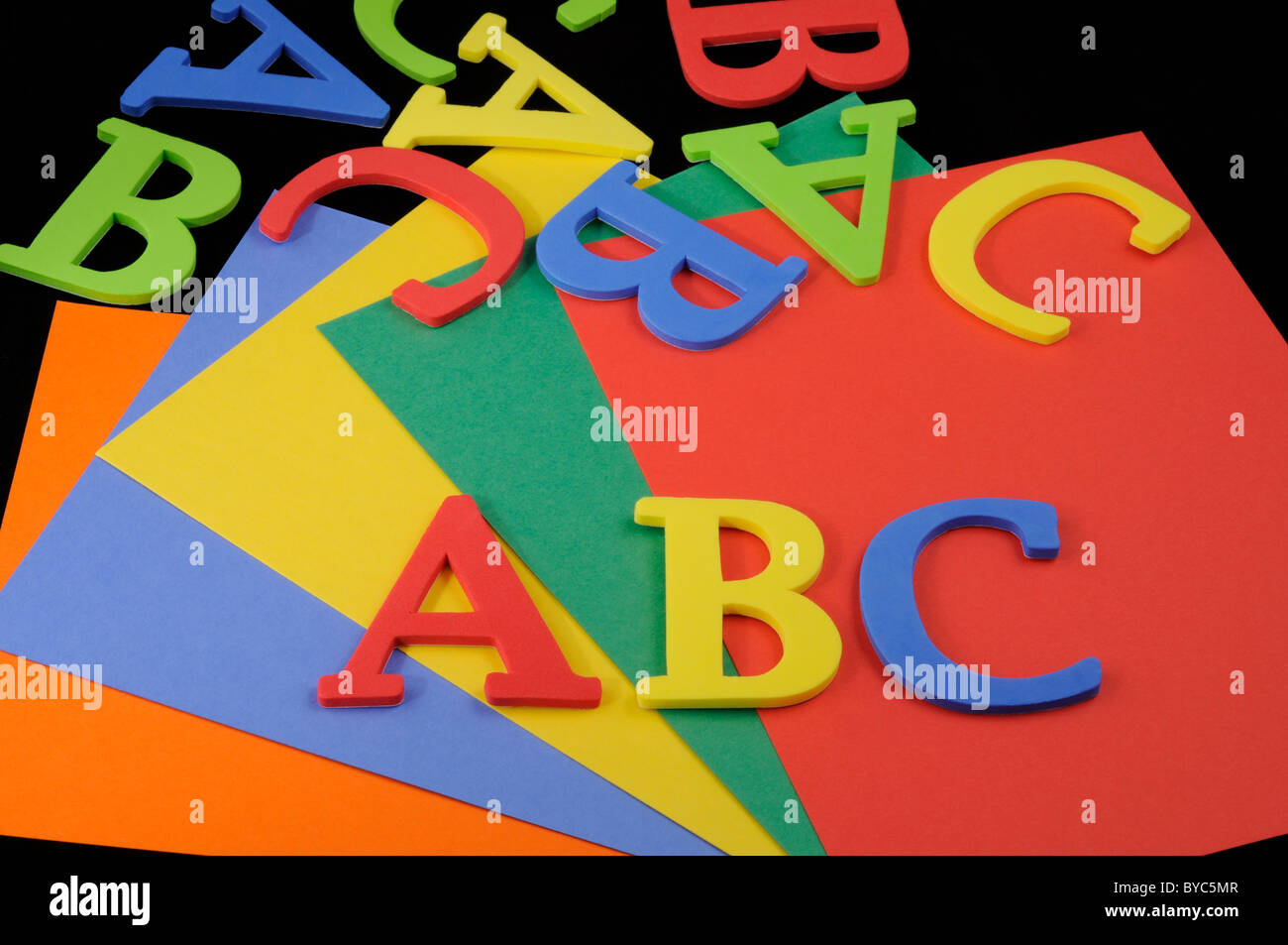 ABC letters and colorful paper Stock Photo - Alamy