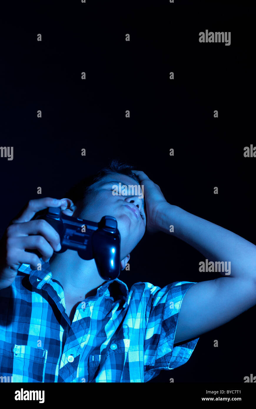 Playstation console teenager hi-res stock photography and images - Alamy