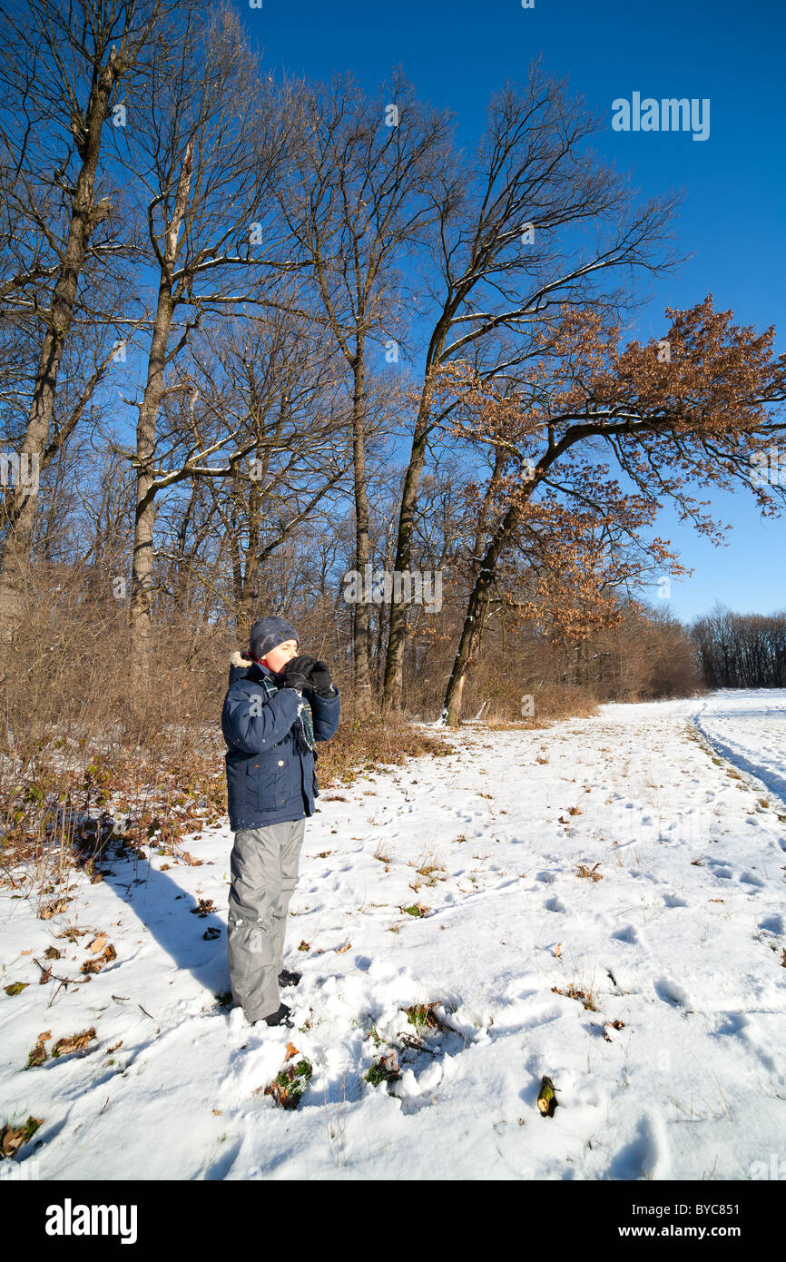 Happy cute boy shouting to hear the echo in the forest Stock Photo - Alamy