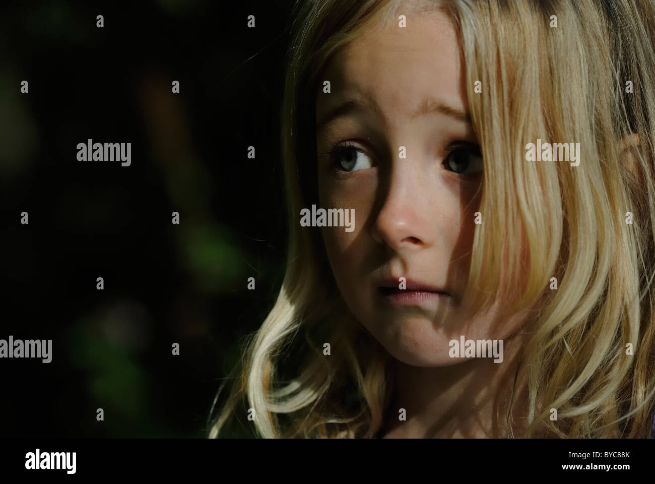 Sad looking young girl, Wales Stock Photo - Alamy