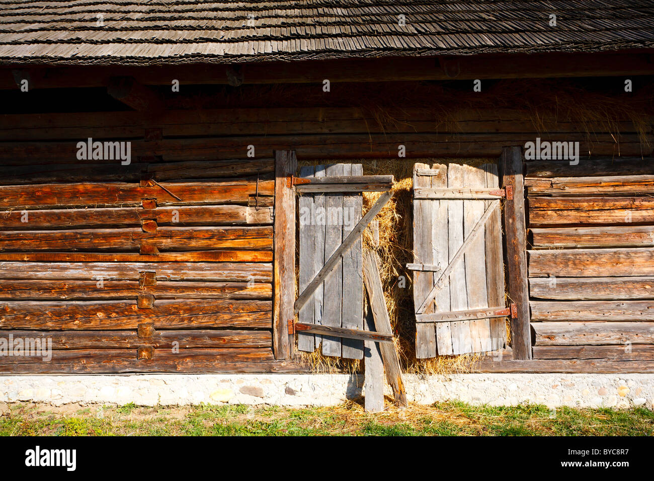 Old traditional Romanian barn or shack under blue sky - this is part of ...