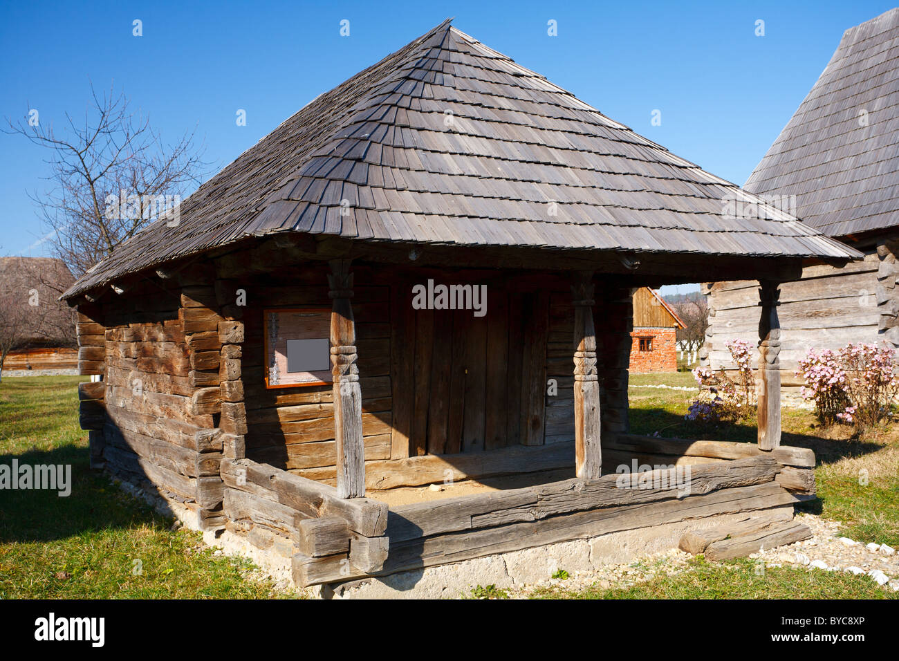Old traditional Romanian barn or shack under blue sky - this is part of ...