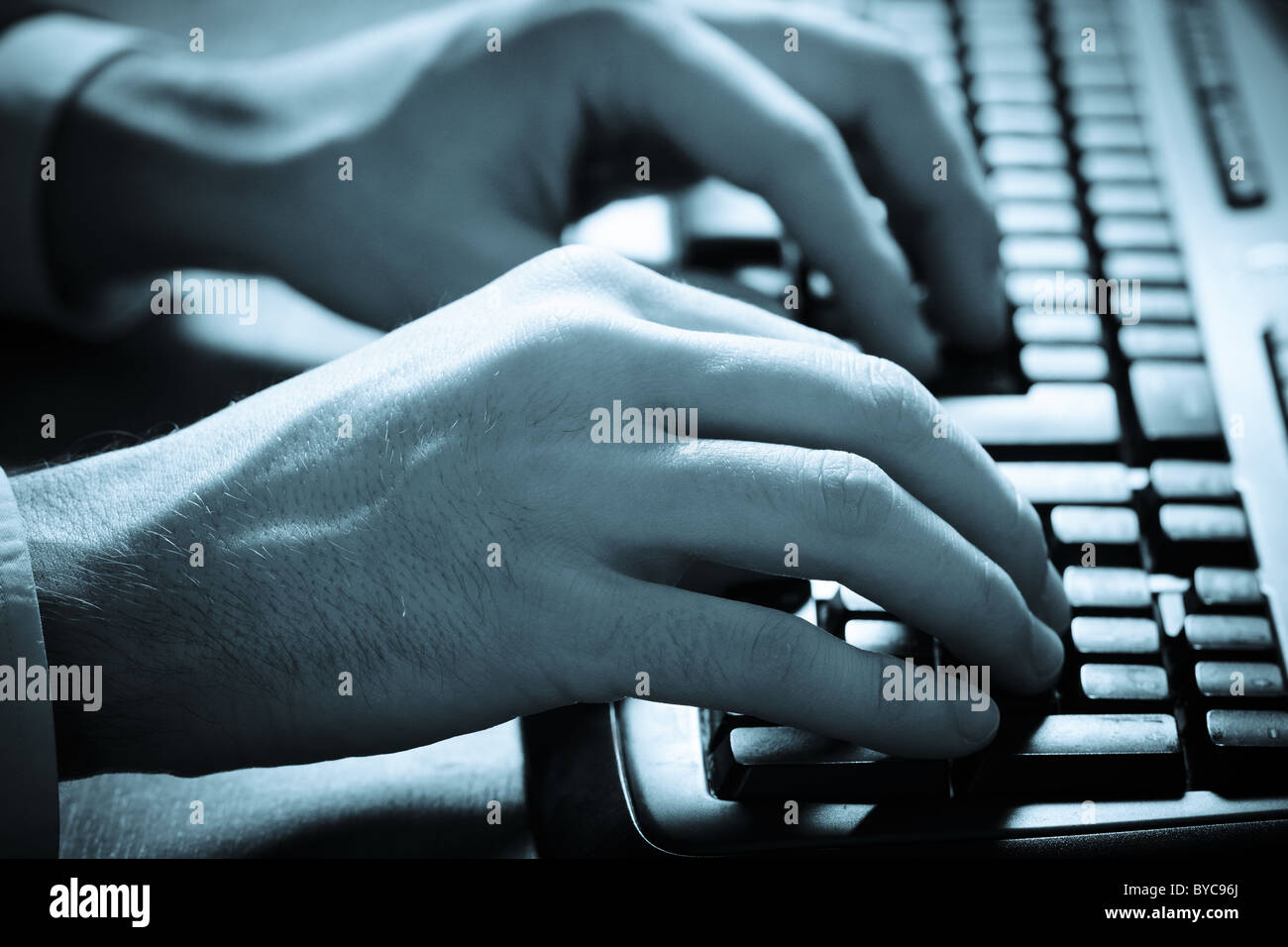 Business man typing on a computer keyboard. Close up Stock Photo - Alamy