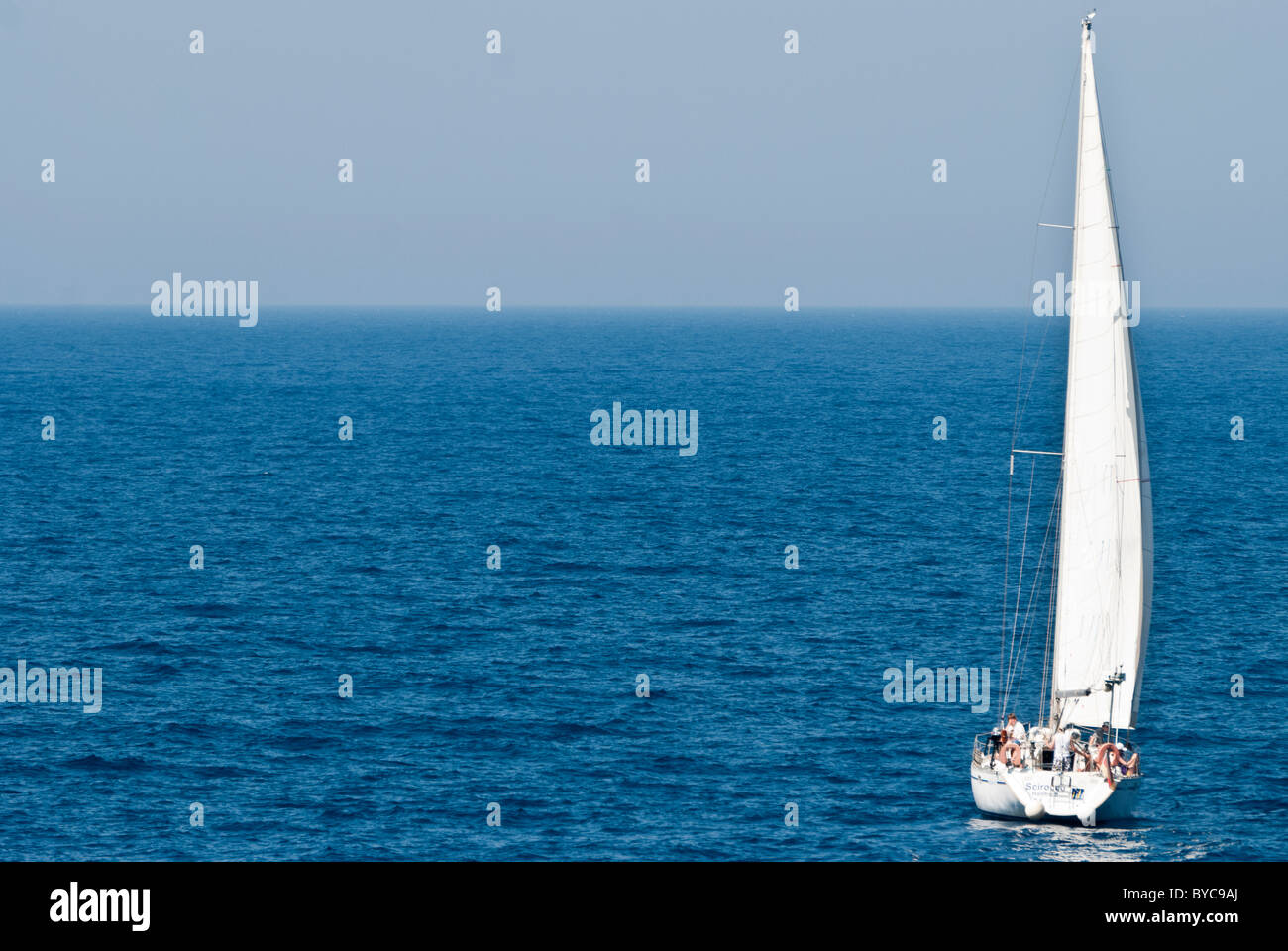 Sailboat in the middle of the sea Stock Photo - Alamy