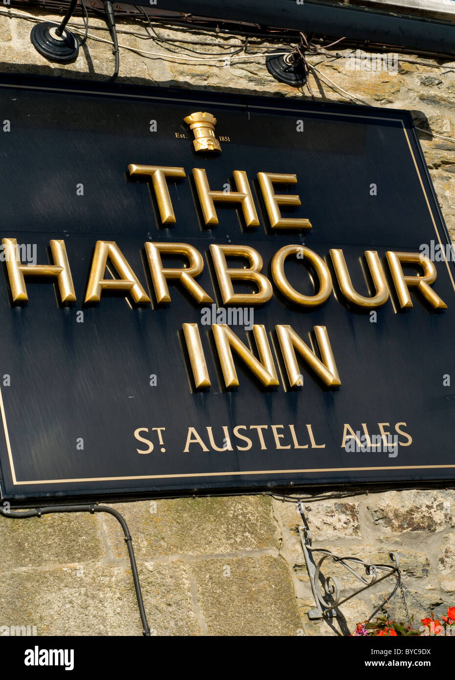 The sign outside the Harbour Inn pub at Porthleven in Cornwall, England ...