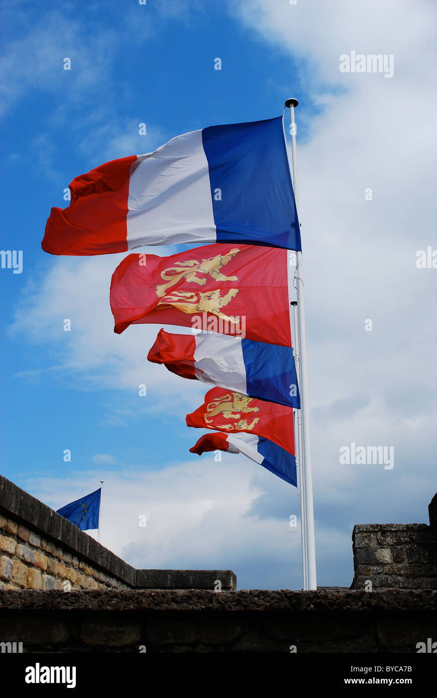 Flags of France and Normandy flying at Caen Castle, France Stock Photo ...