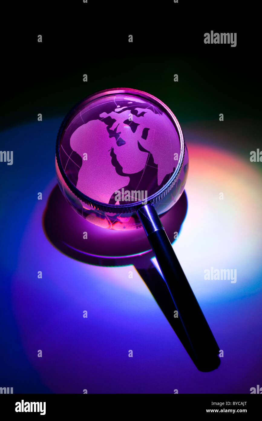 Magnifying glass globe hi-res stock photography and images - Alamy