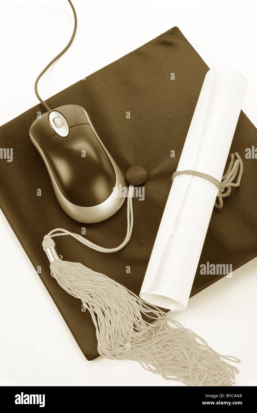 Black Mortarboard and computer mouse, online learning Stock Photo - Alamy