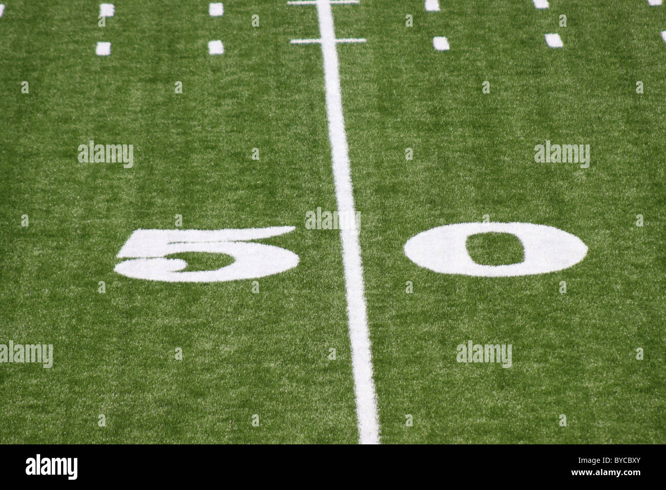 Fifty yard line of football Field Stock Photo - Alamy