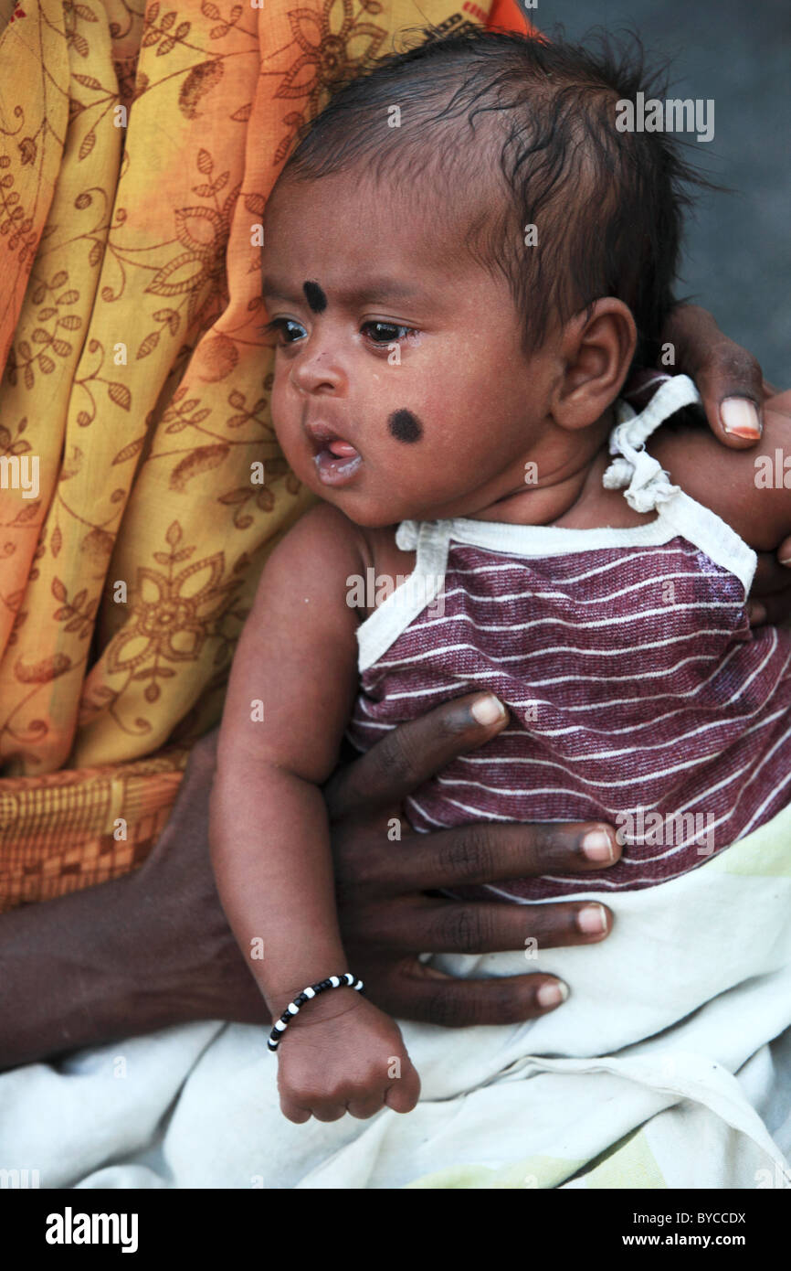 Mother holding her baby Andhra Pradesh South India Stock Photo - Alamy
