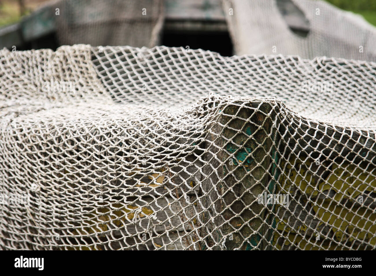 Close-up of an old fishing net Stock Photo - Alamy