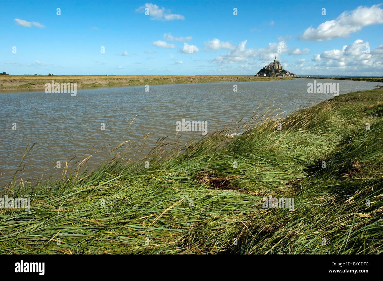 The Couesnon river in front of Mont Saint-Michel, a fortified medieval ...