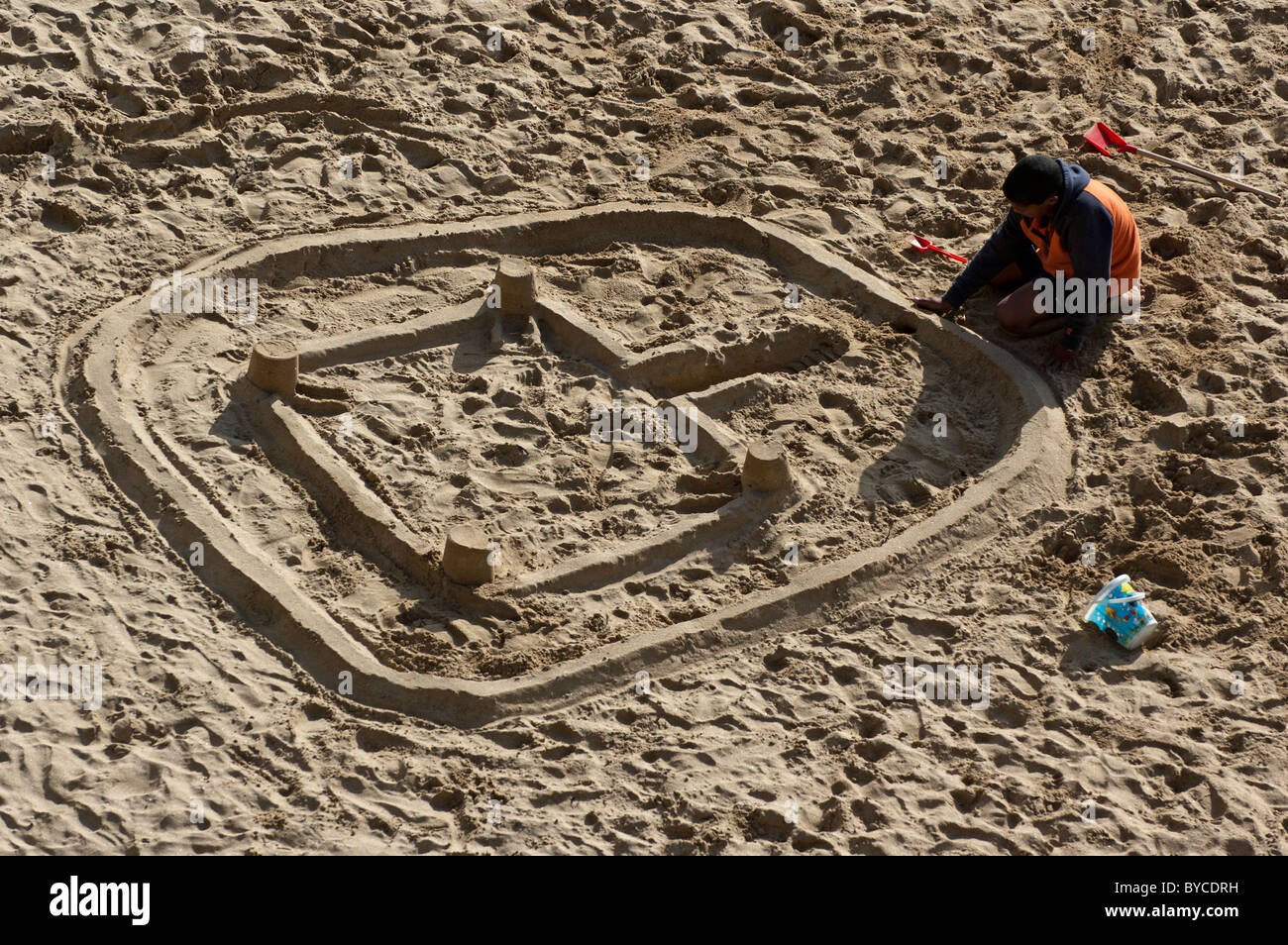 Boy building sandcastles hi-res stock photography and images - Alamy