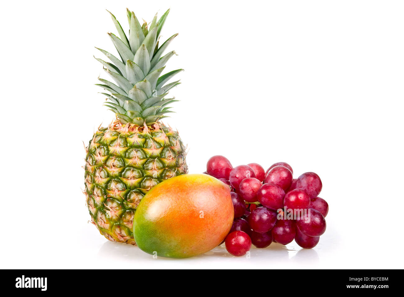 Pineapple, mango and grapes isolated Stock Photo - Alamy