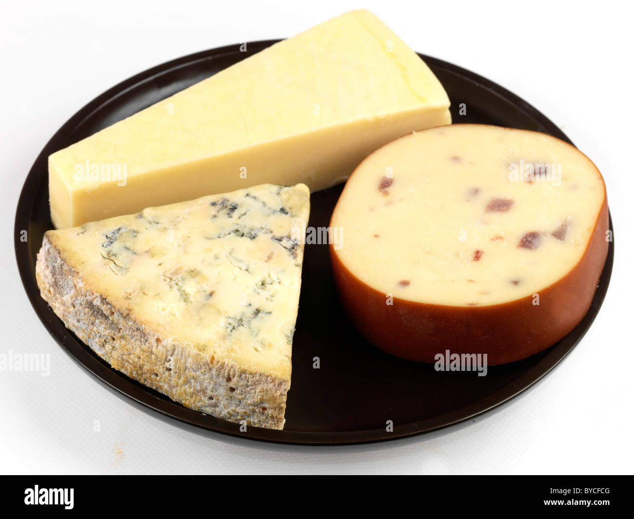 Selection of Dessert Cheeses Served On A Plate Including Cheddar Cheese ...