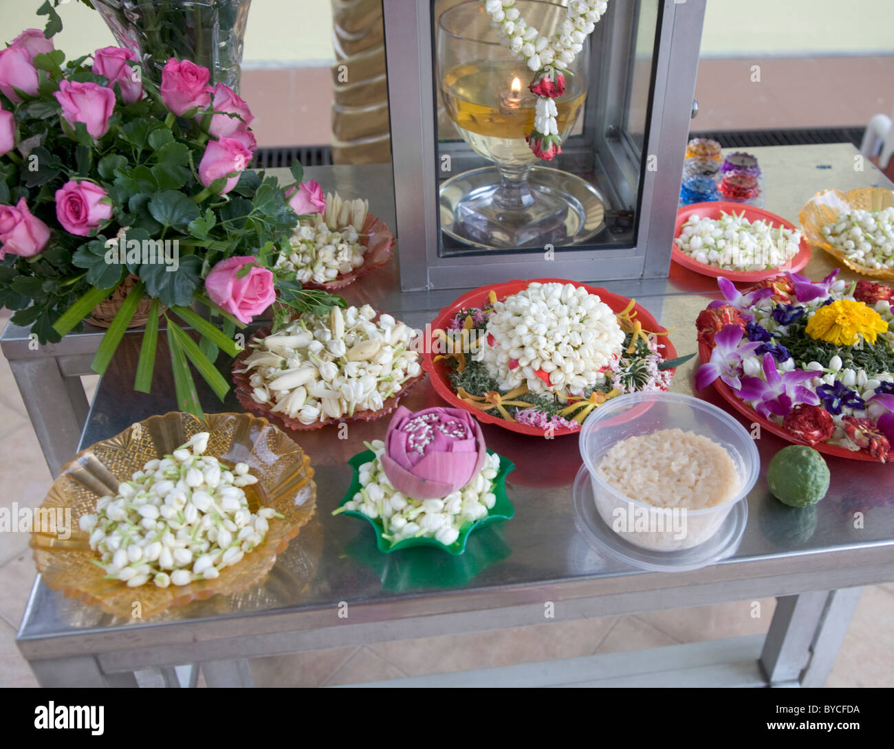 Food offerings at a Buddhist Temple in Singapore Stock Photo - Alamy