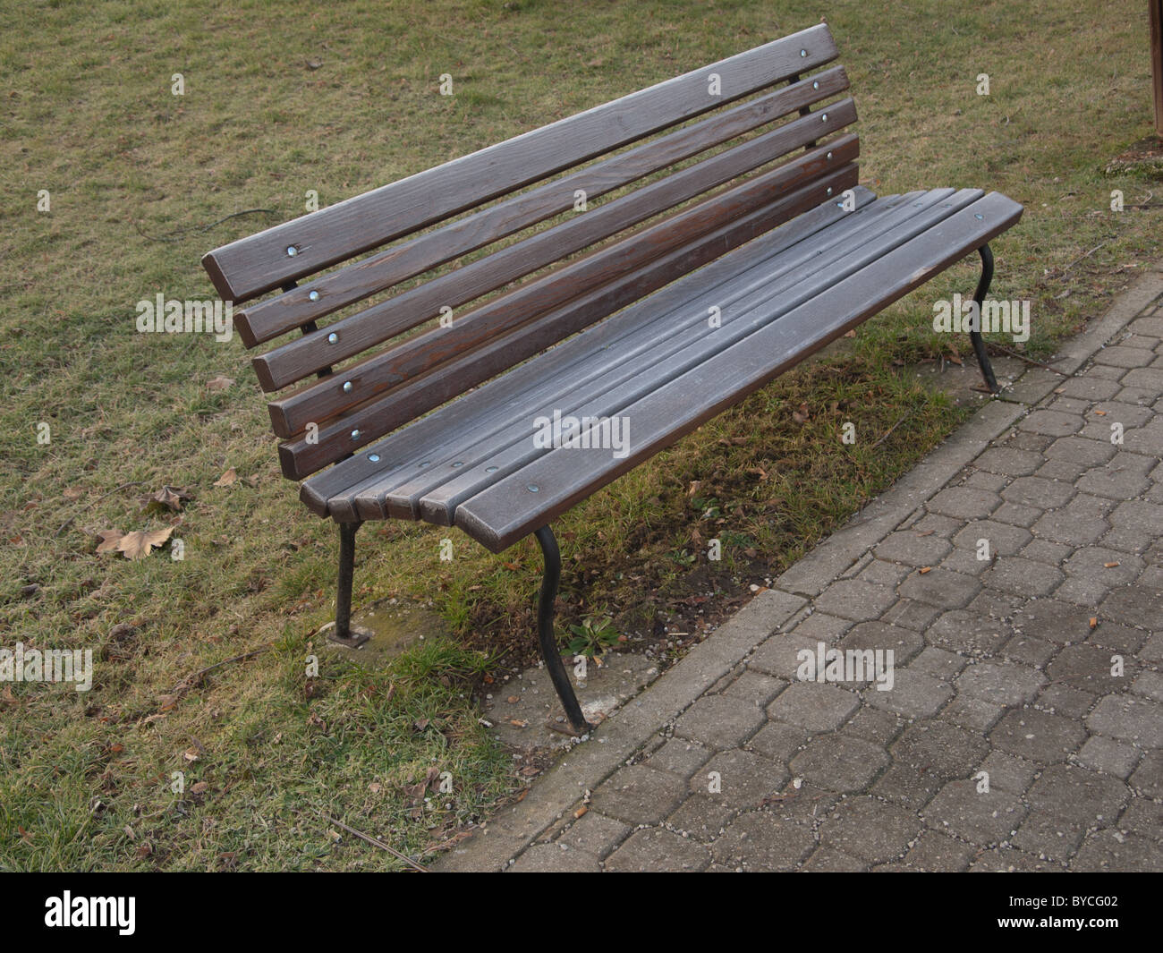 Iced bench in the park Stock Photo - Alamy