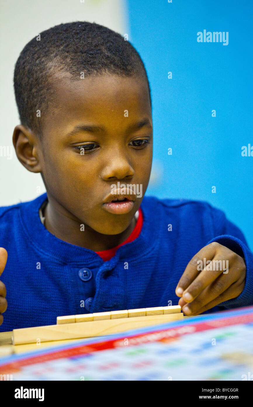 Scrabble board boy hi-res stock photography and images - Alamy