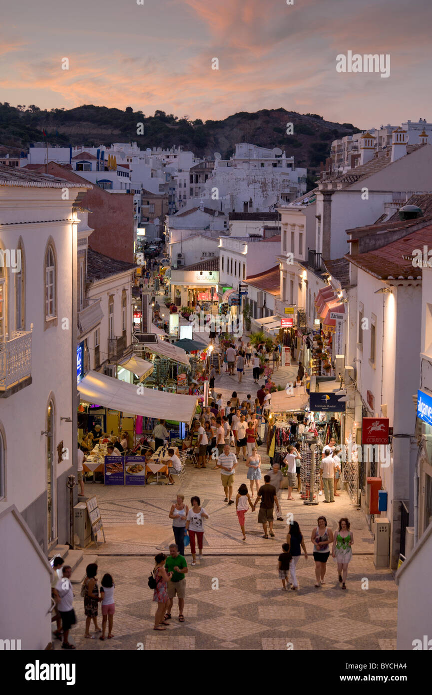 Portugal, Albufeira, main shopping street at dusk Stock Photo - Alamy