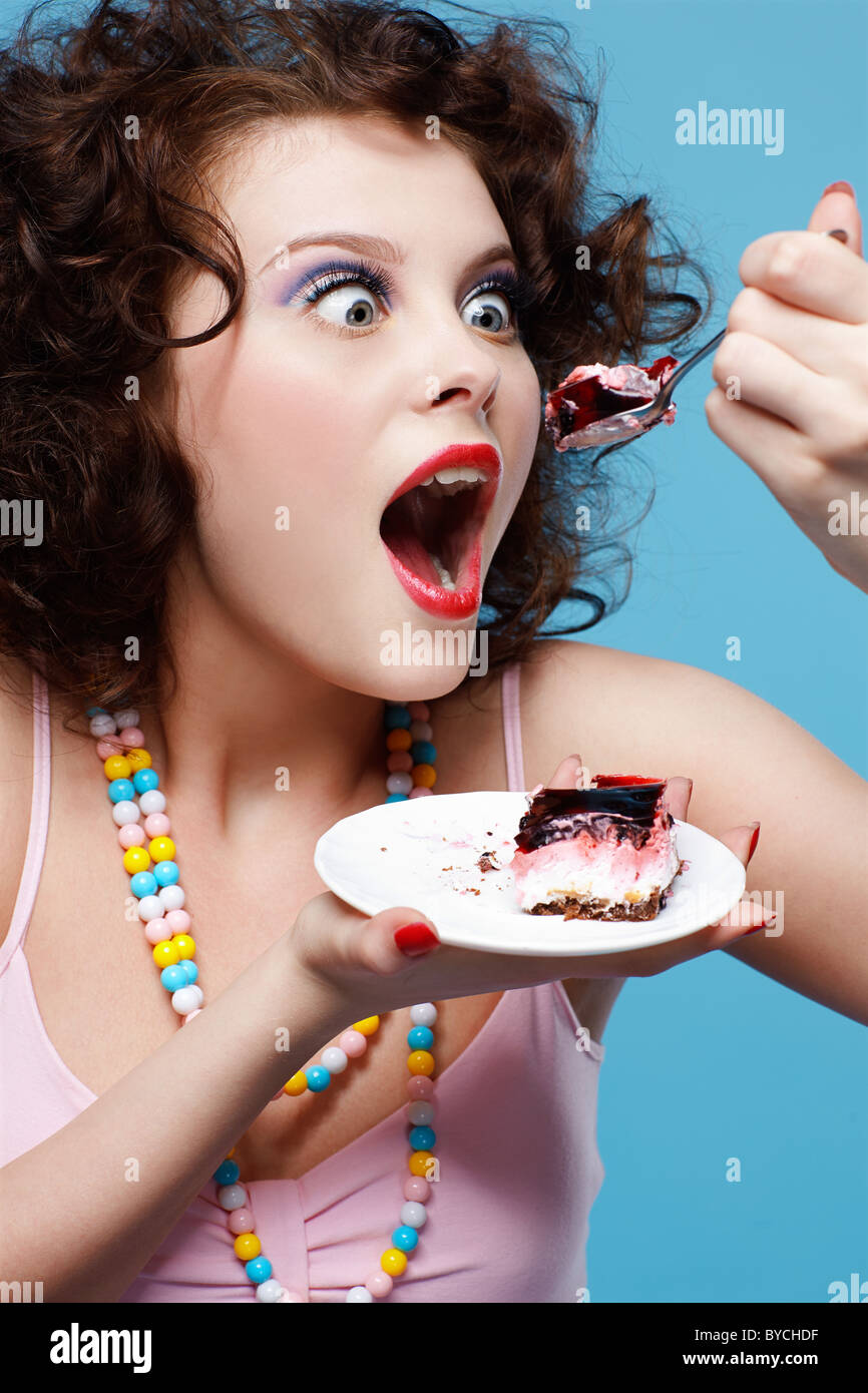 girl eating cake Stock Photo - Alamy
