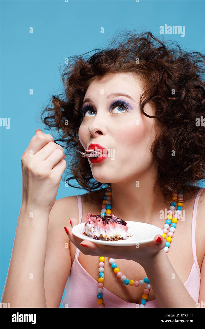 girl eating cake Stock Photo - Alamy