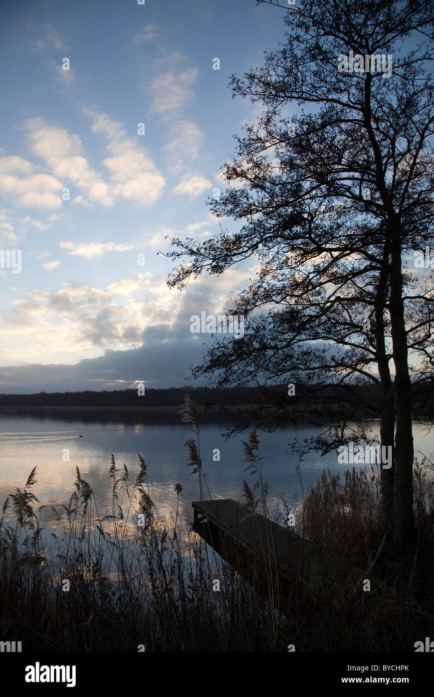 Sunset over Rollesby Broad, East Norfolk, East Anglia, England Stock ...