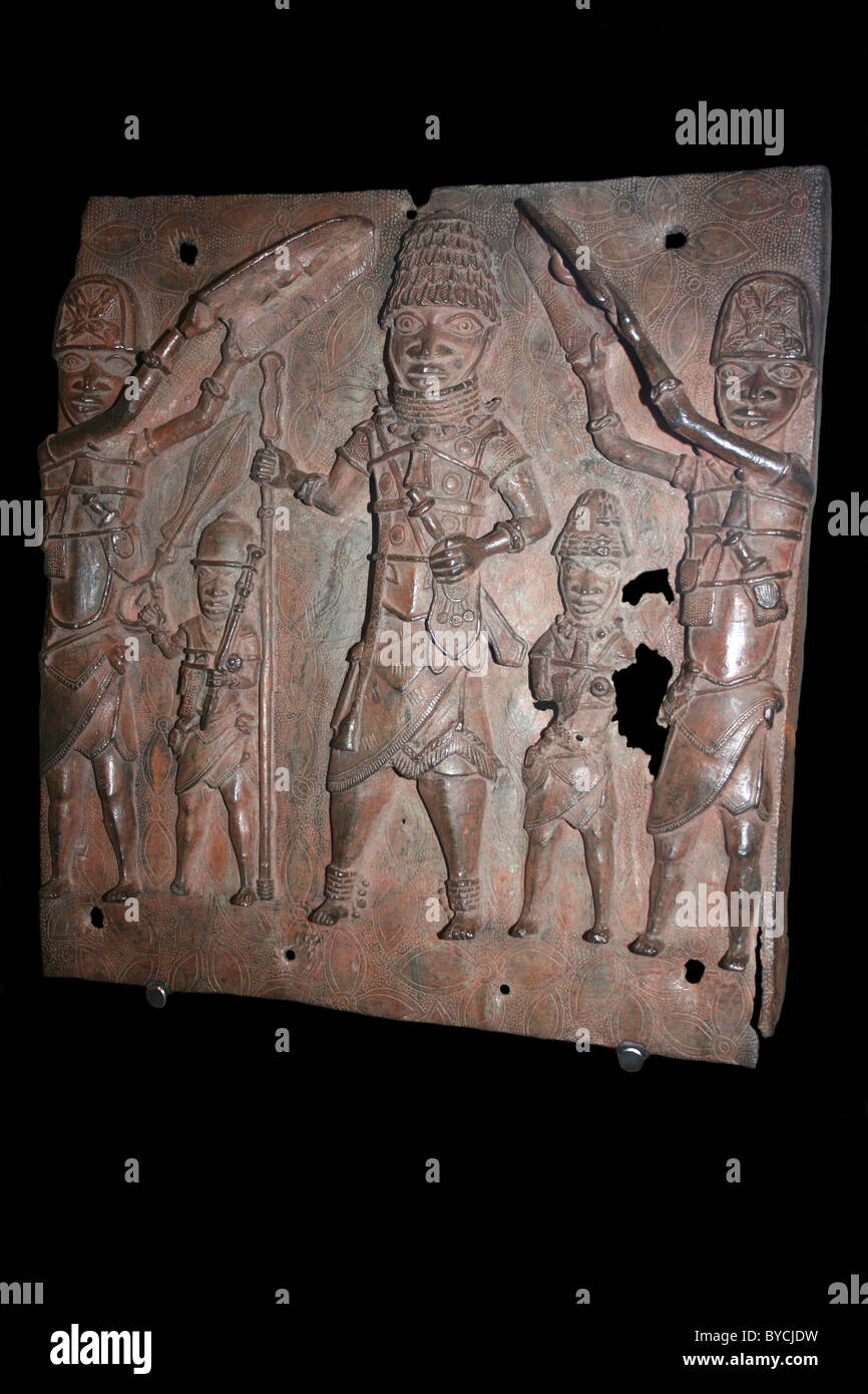 Brass Plaque showing The Oba Of Benin With Attendants Stock Photo - Alamy