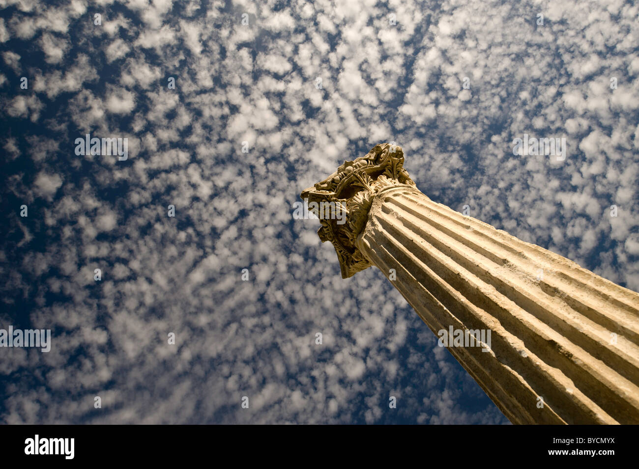 A single Byantine column set against clouds and a blue sky Stock Photo ...