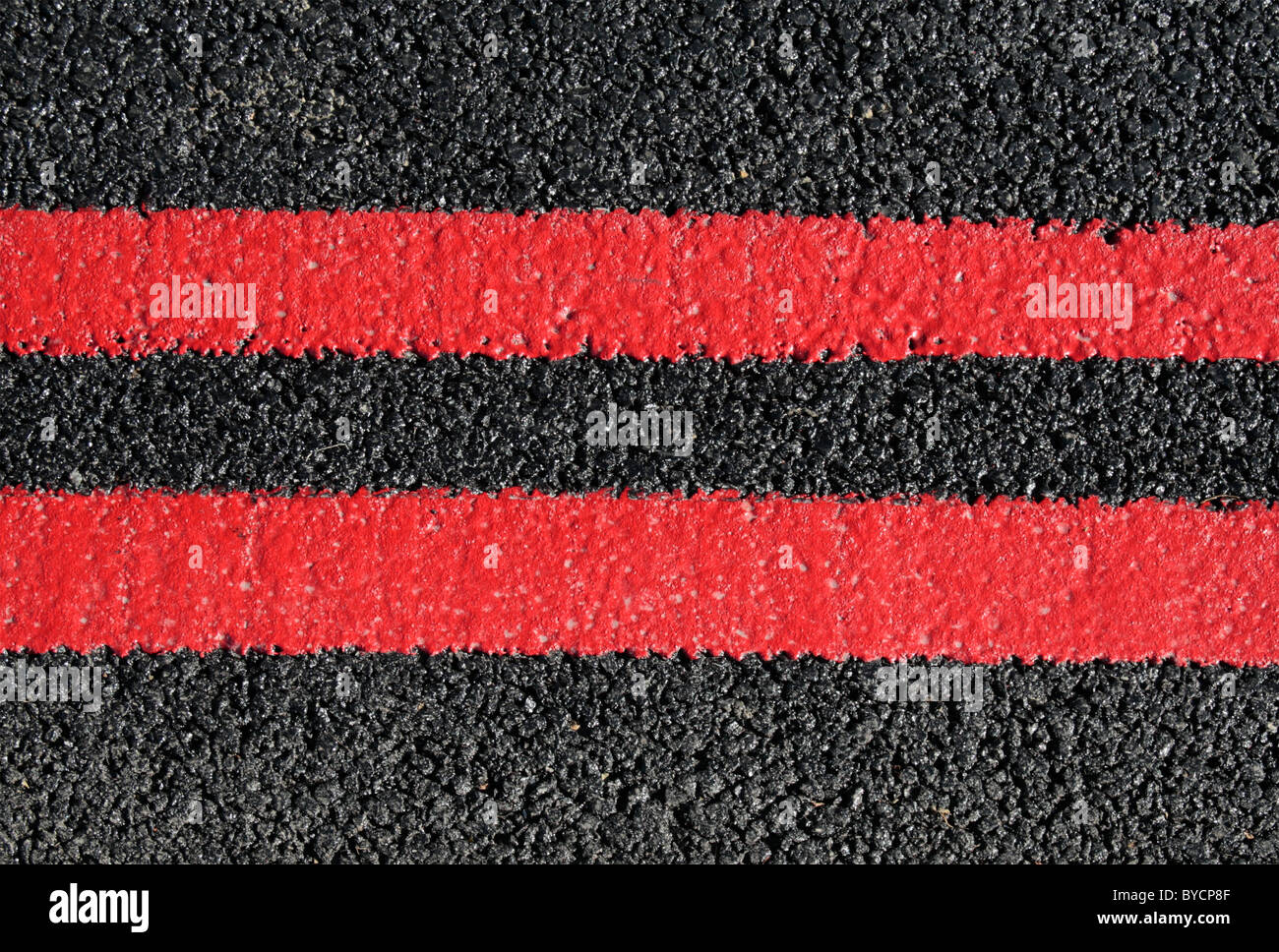Double red lines (on a Red Route) limiting parking on a street in ...