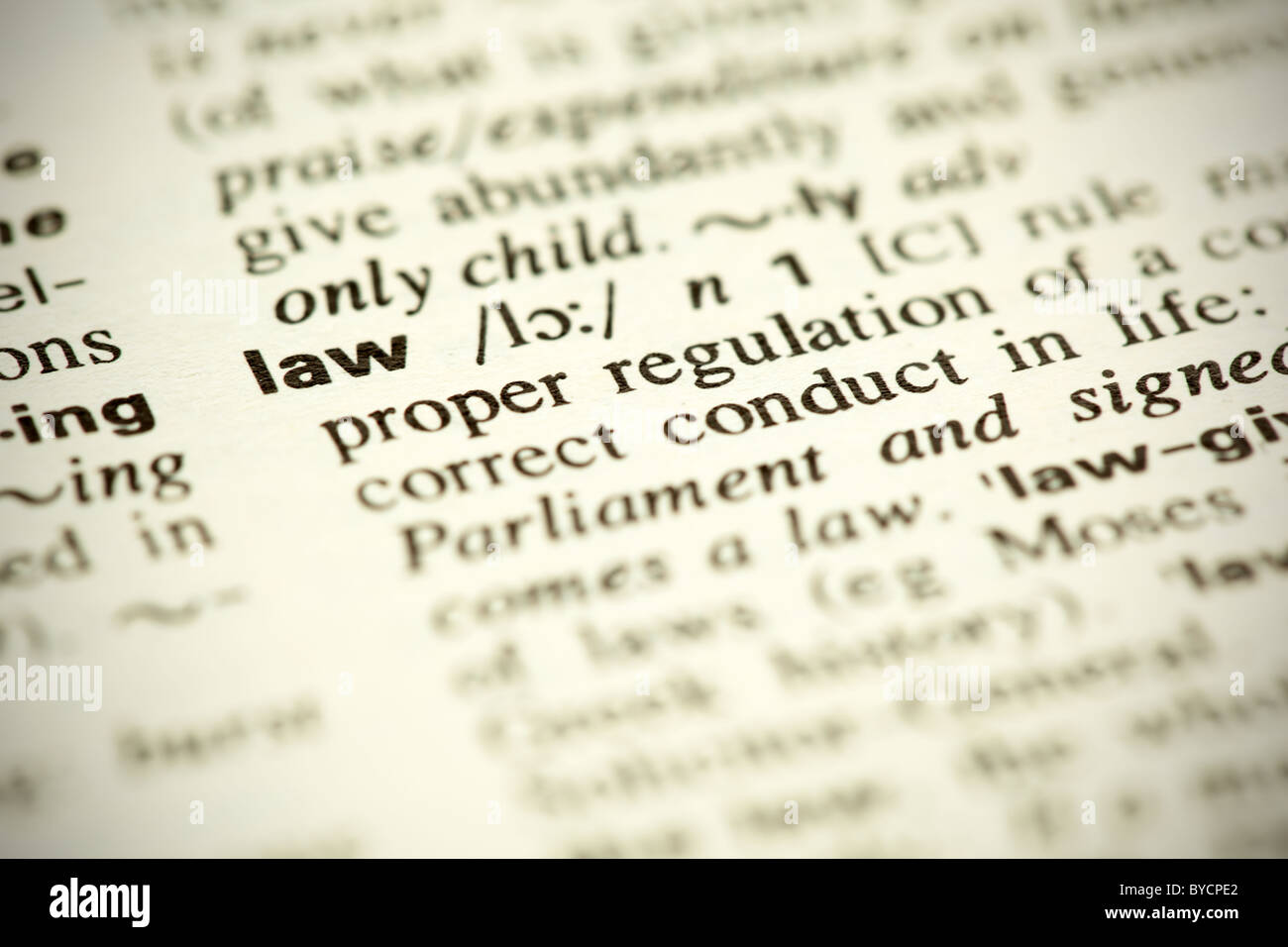A small DOF image of the dictionary definition of the word "Law Stock ...