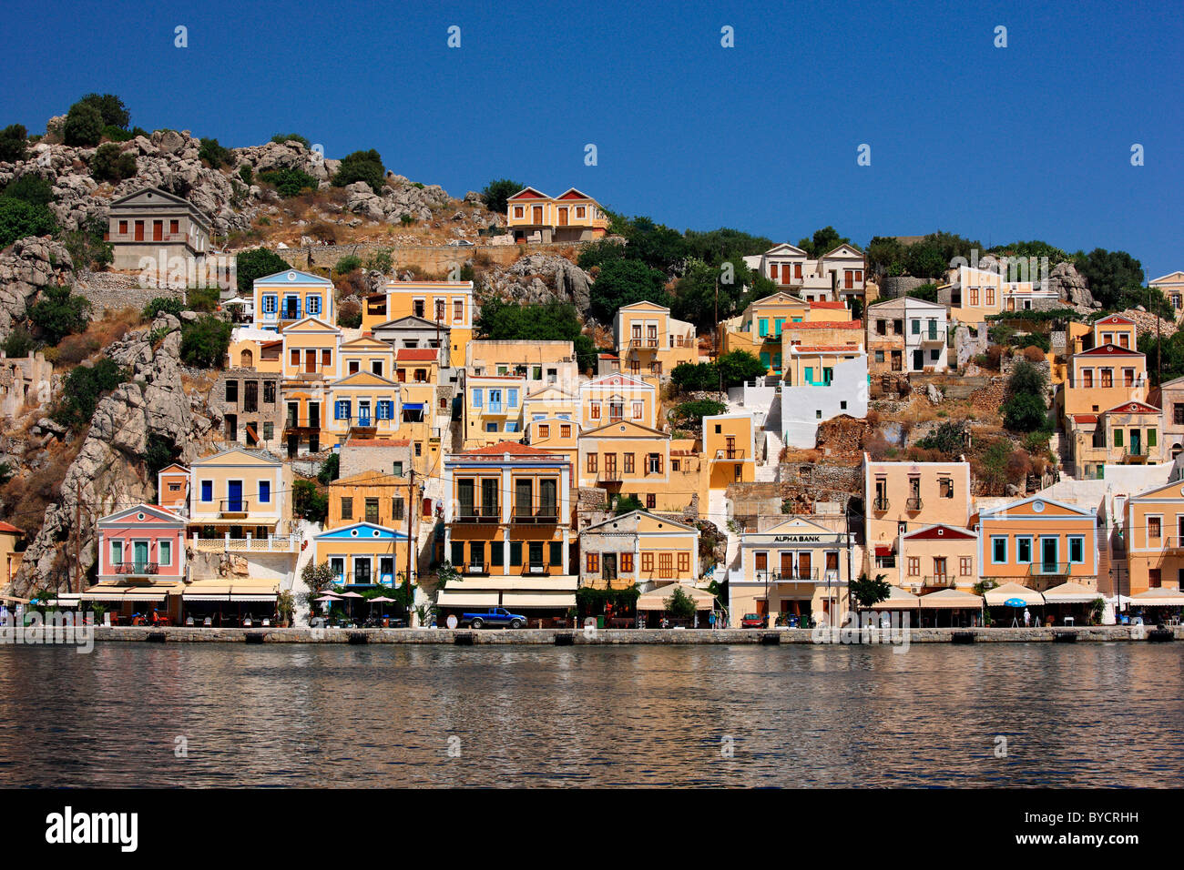 Partial view of Gyalos village, capital and main port of Symi island ...